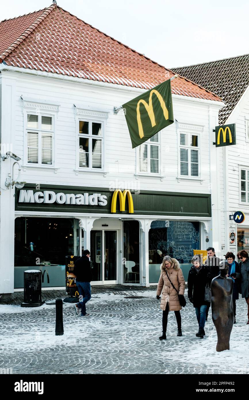 Stavanger, Norway, March 10 2023, Group Of People Walking Past A ...