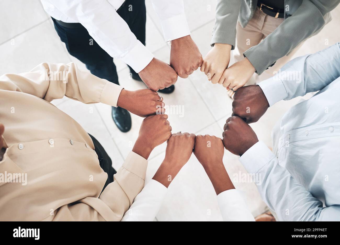 Mission, circle or business people fist bump for partnership or ...