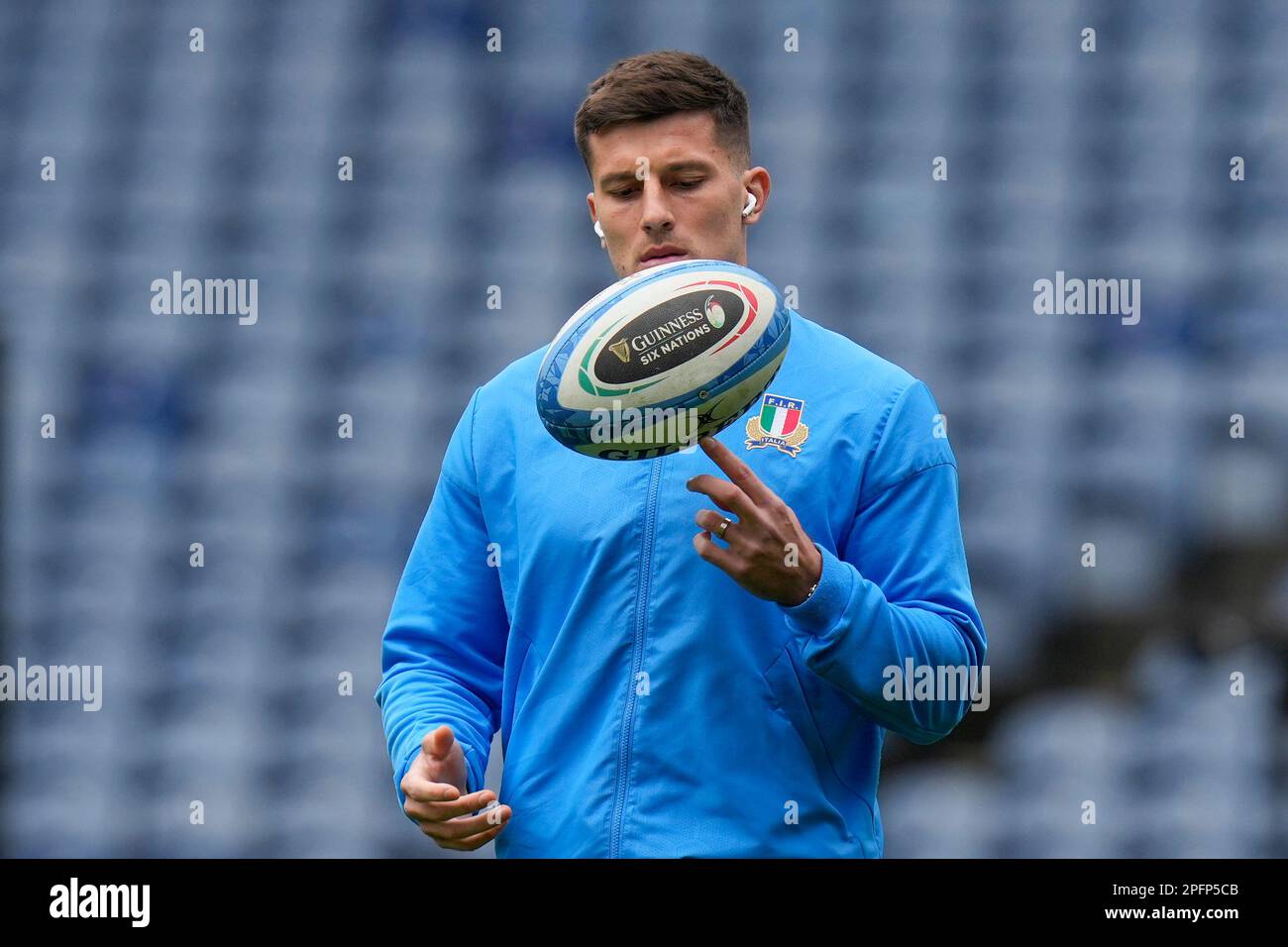 Tommaso Allan #15 of Italy juggles the ball while he inspects the pitch ...