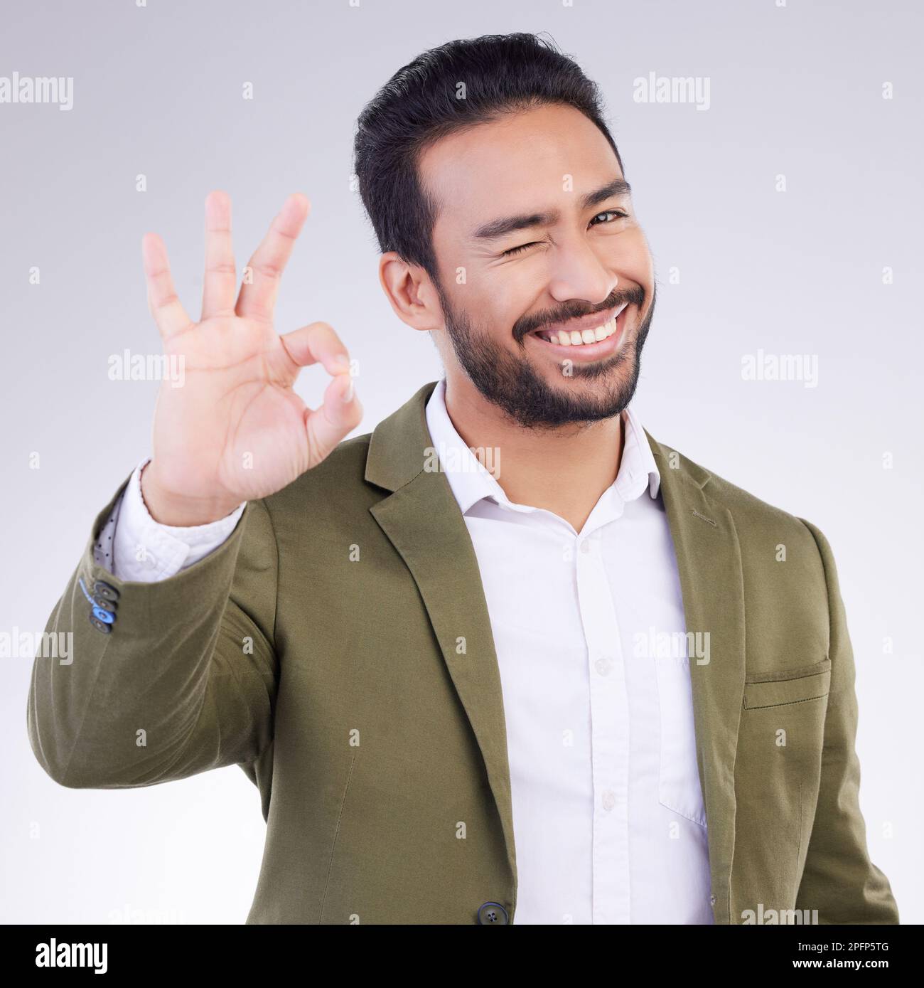 OK hand, portrait and business man isolated on a white background ...