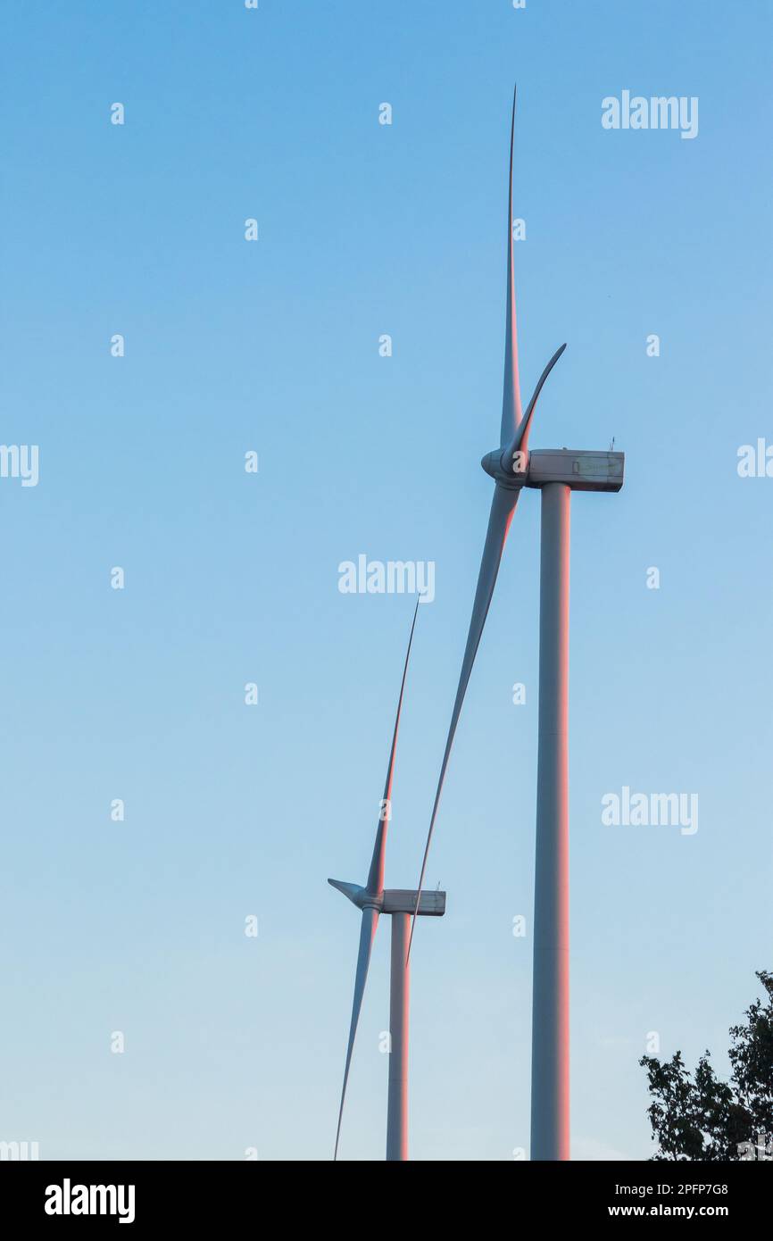 A wind turbine is a machine that can receive and convert the kinetic ...