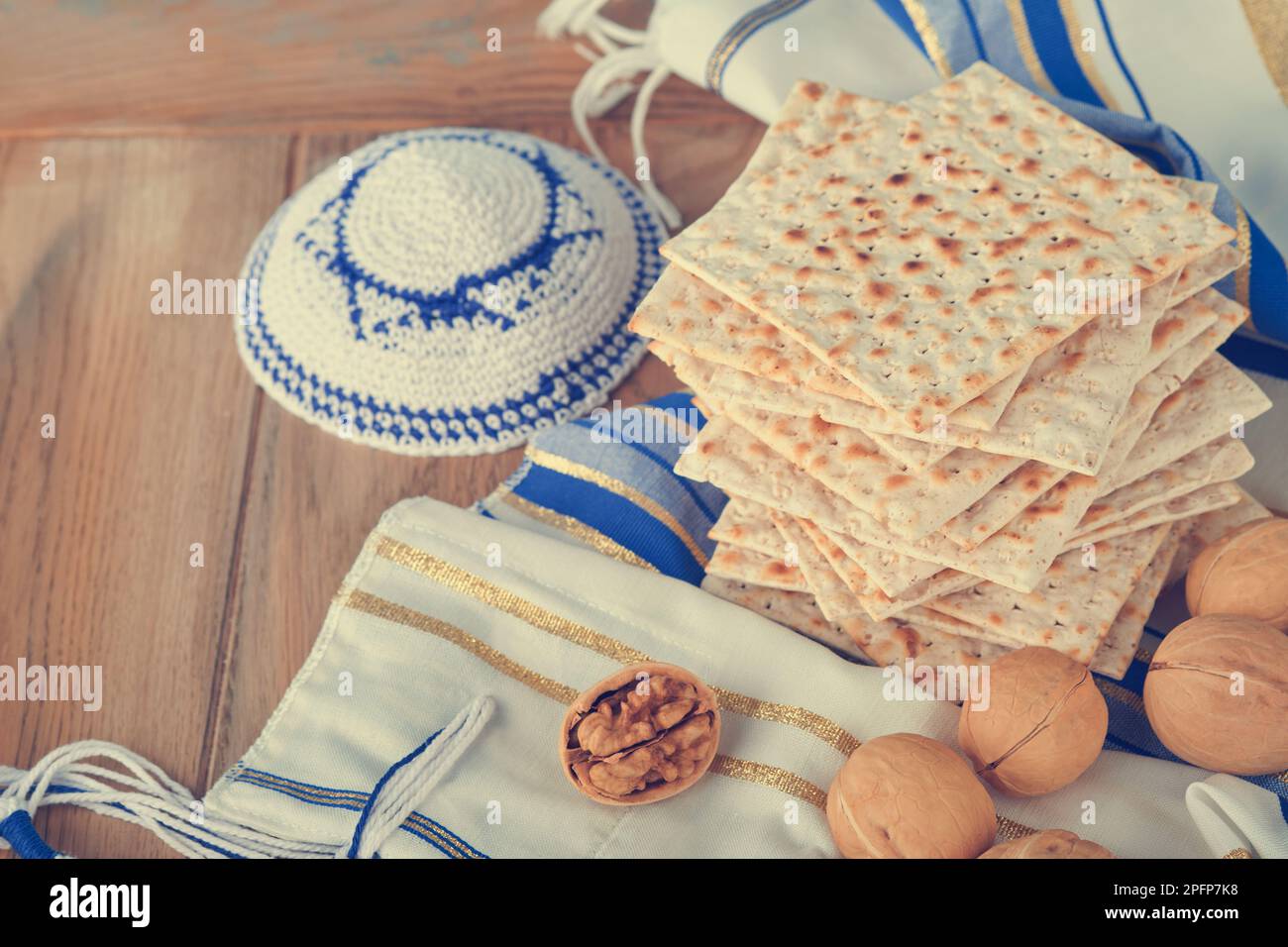 Passover celebration concept. Matzah, red kosher and walnut ...