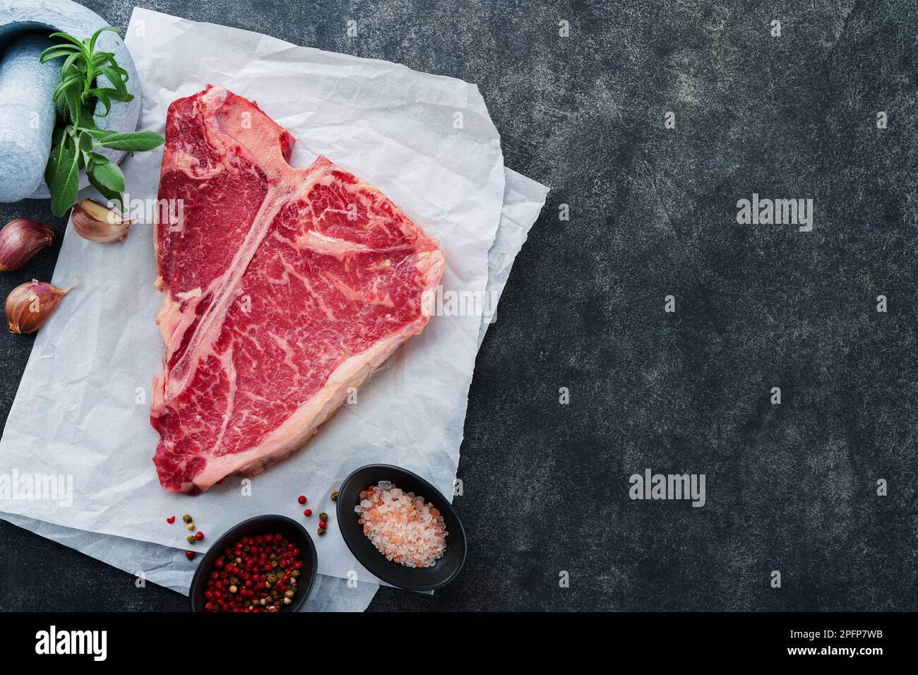 Thick Raw T-Bone Steak. Dry-aged Raw T-bone or porterhouse beef meat ...