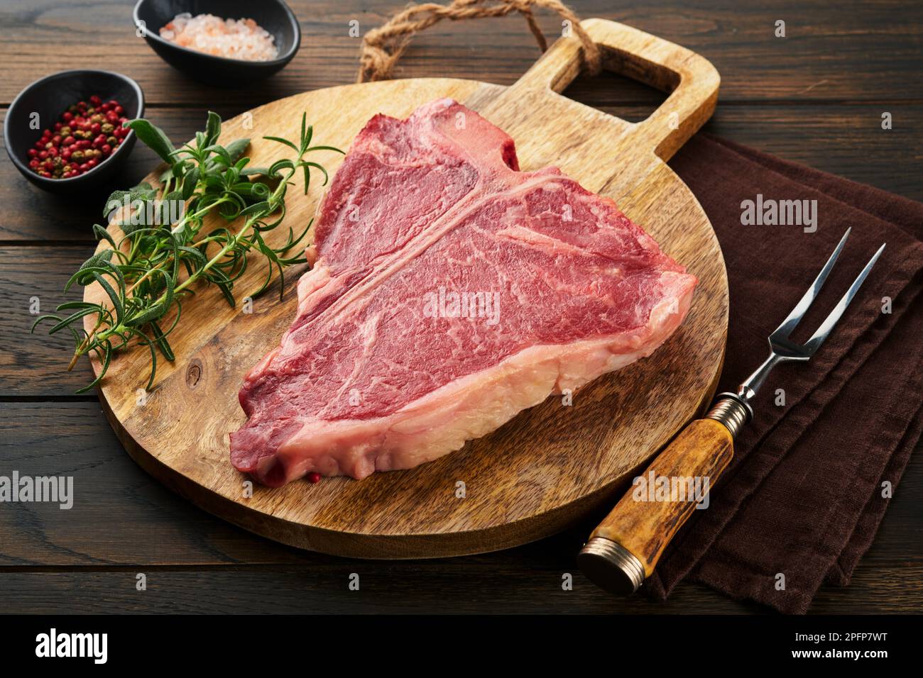 Thick Raw T-Bone Steak. Dry-aged Raw T-bone or porterhouse beef meat ...