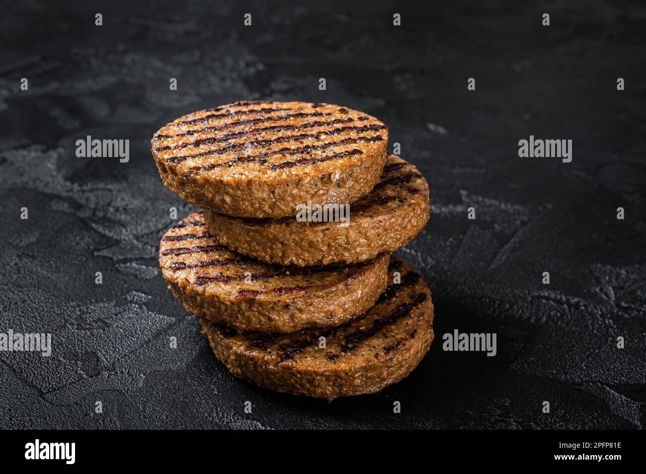 Griiled meat free patties, plant based meat steak cutlets. Black ...