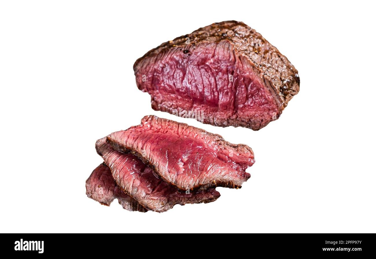 Grilled Rump sirloin steak sliced on a tray with herbs. Isolated on ...