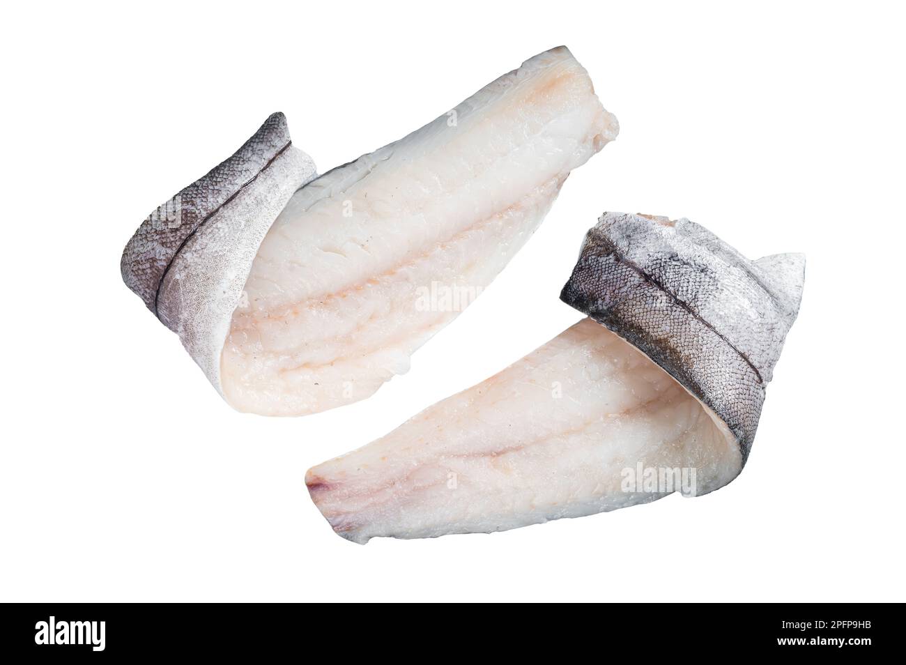 Two raw haddock fish fillets on kitchen table. Isolated on white ...