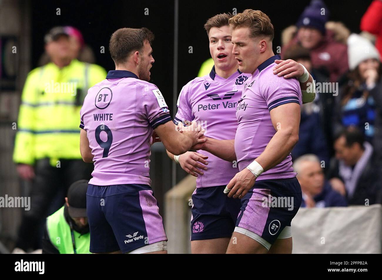 Scotland's Duhan van der Merwe (right) celebrates his side's first try ...