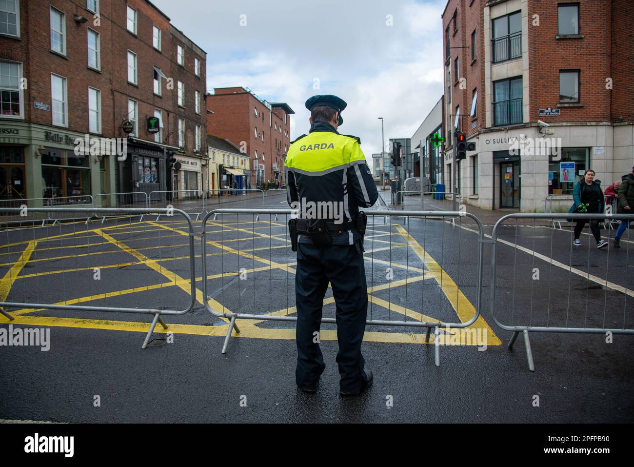 Garda at work during Patrick day in Limerick Ireland Stock Photo - Alamy
