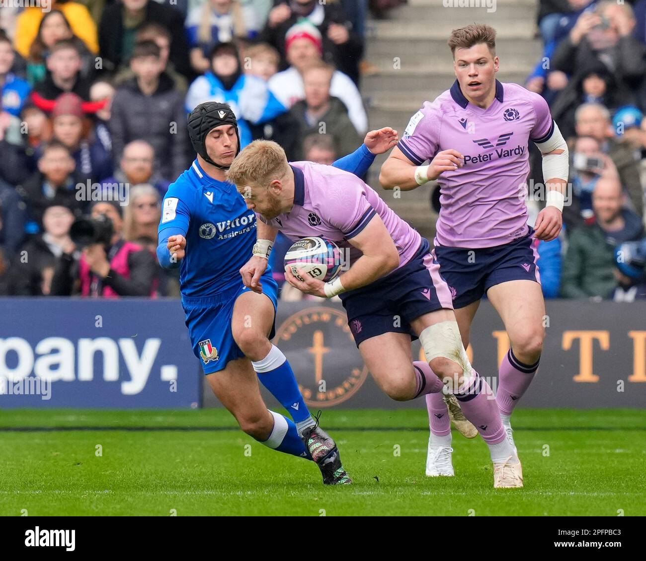 Simone Gesi #11 of Italy tackles Kyle Steyn #14 of Scotland during the ...