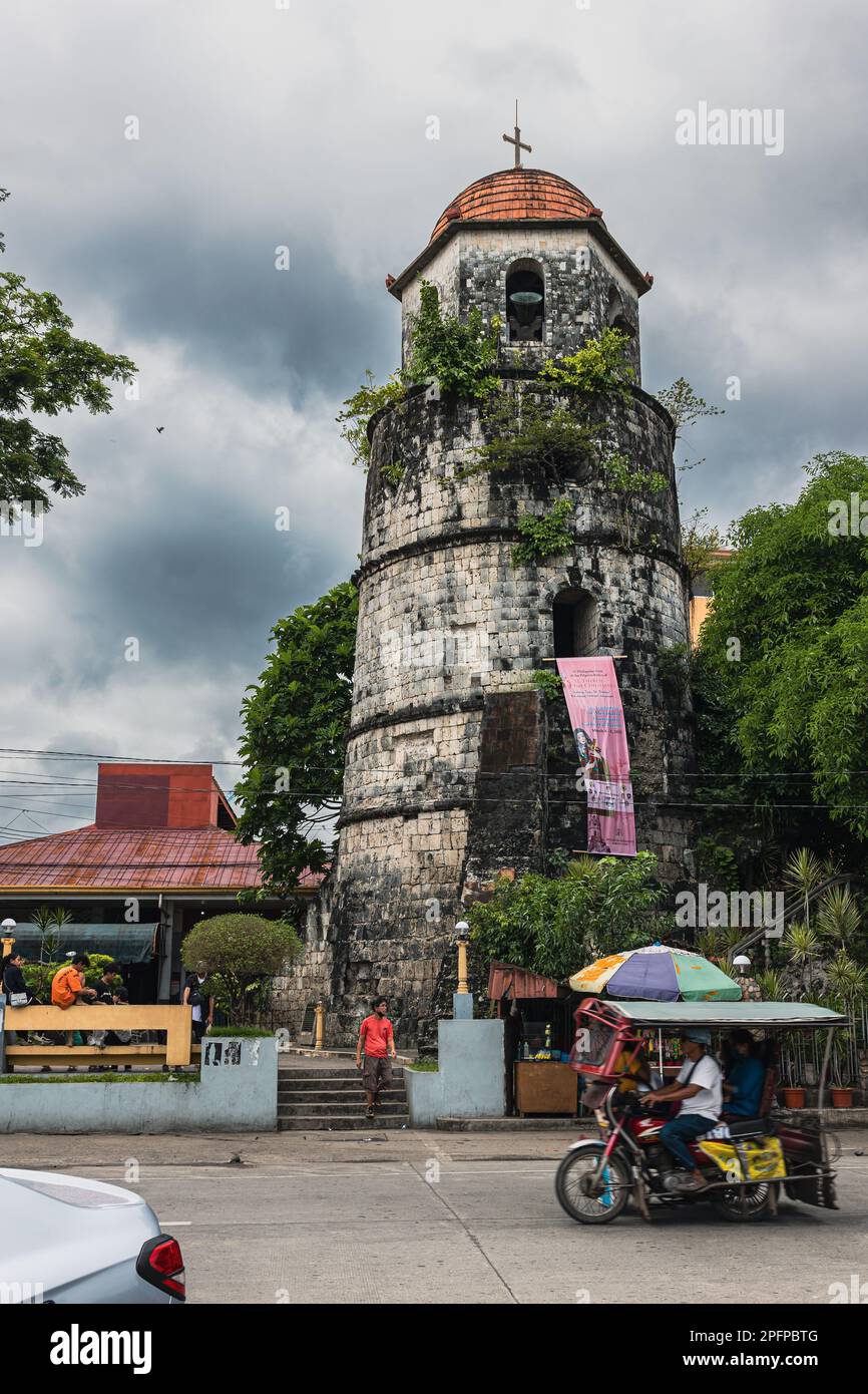 A vertical shot of an aged Christian bell tower church in the ...