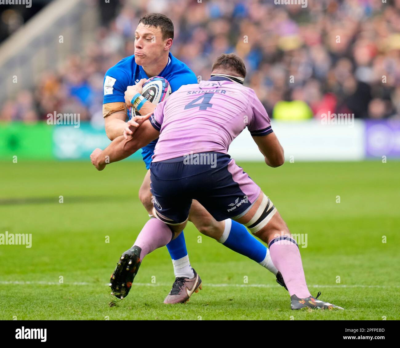 Paolo Garbisi #10 of Italy runs at Sam Skinner #4 of Scotland during ...