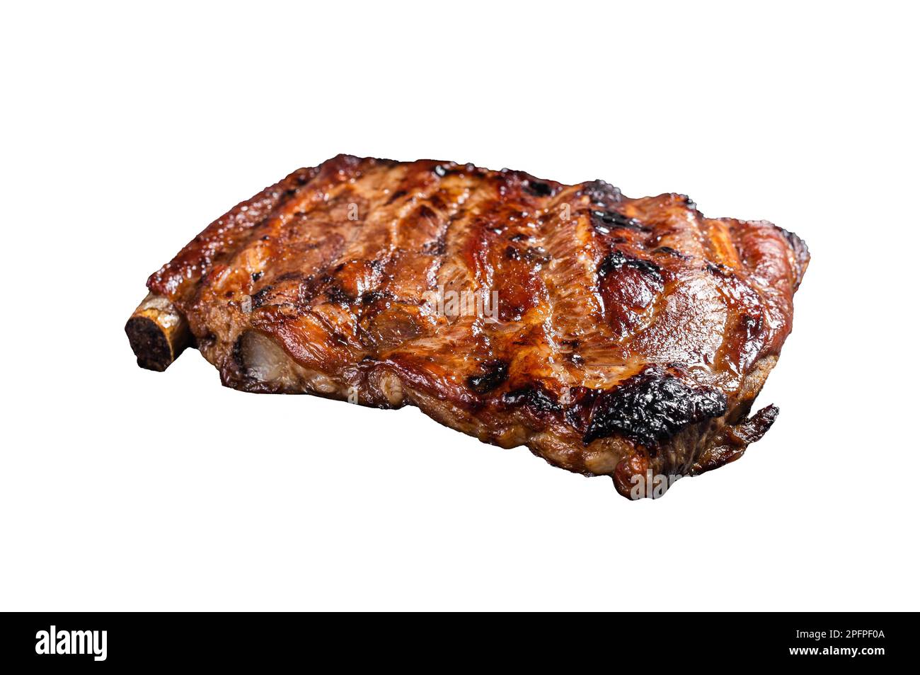 Full rack of BBQ grilled pork spare ribs on a marble board. Isolated on ...