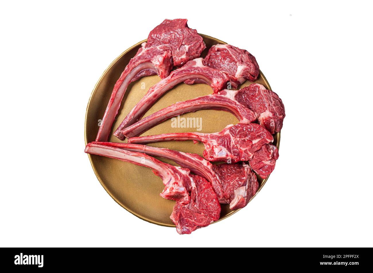 Lamb chop rib steak, raw mutton meat cutlet in golden plate. Isolated ...