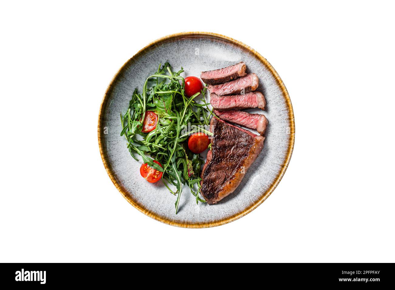 Grilled Top sirloin beef meat steak in plate with vegetable salad ...