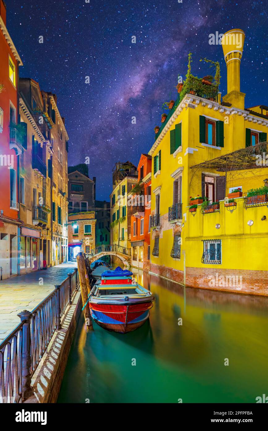 Romantic streets and canals of Venice at night. Empty street with old ...