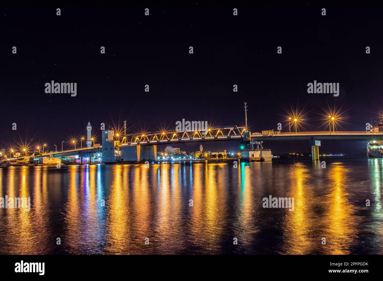 Capturing the Beauty of Bizerte City Bridge at Night Stock Photo - Alamy