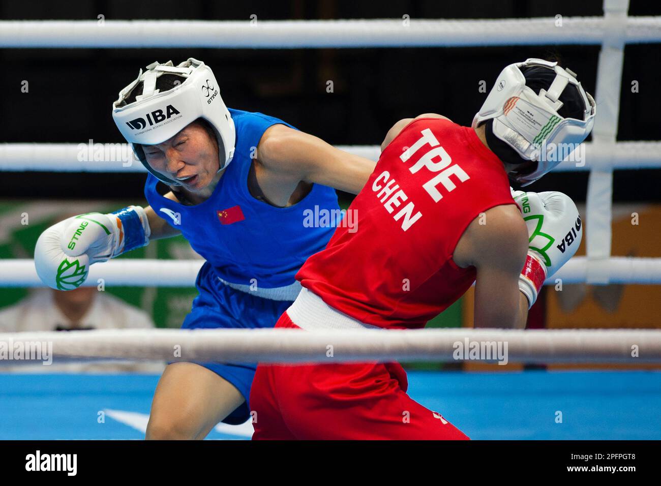 New Delhi, India. 18th Mar, 2023. Yang Liu (L) of China competes with ...