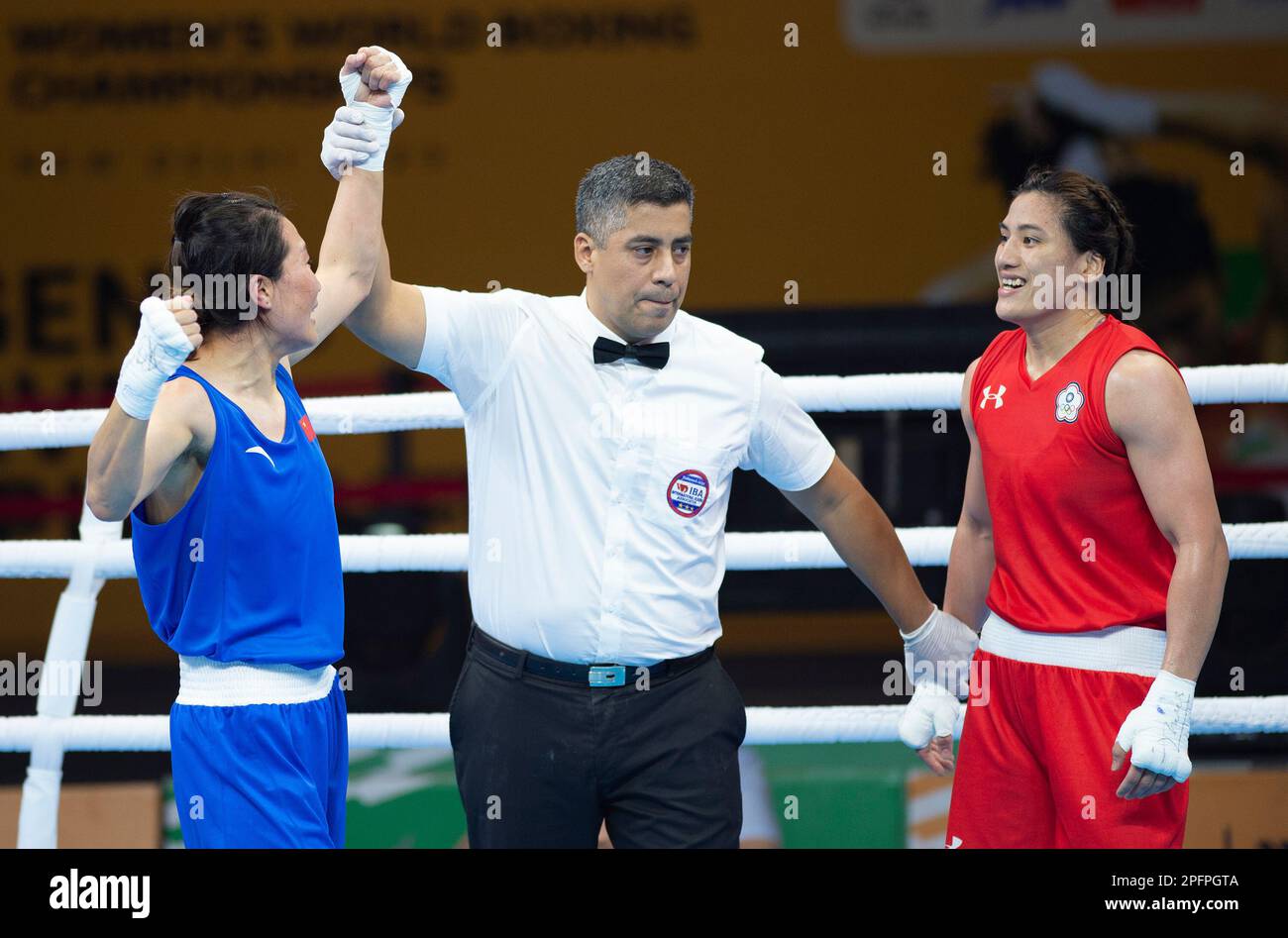 New Delhi, India. 18th Mar, 2023. Yang Liu (L) of China is declared the ...