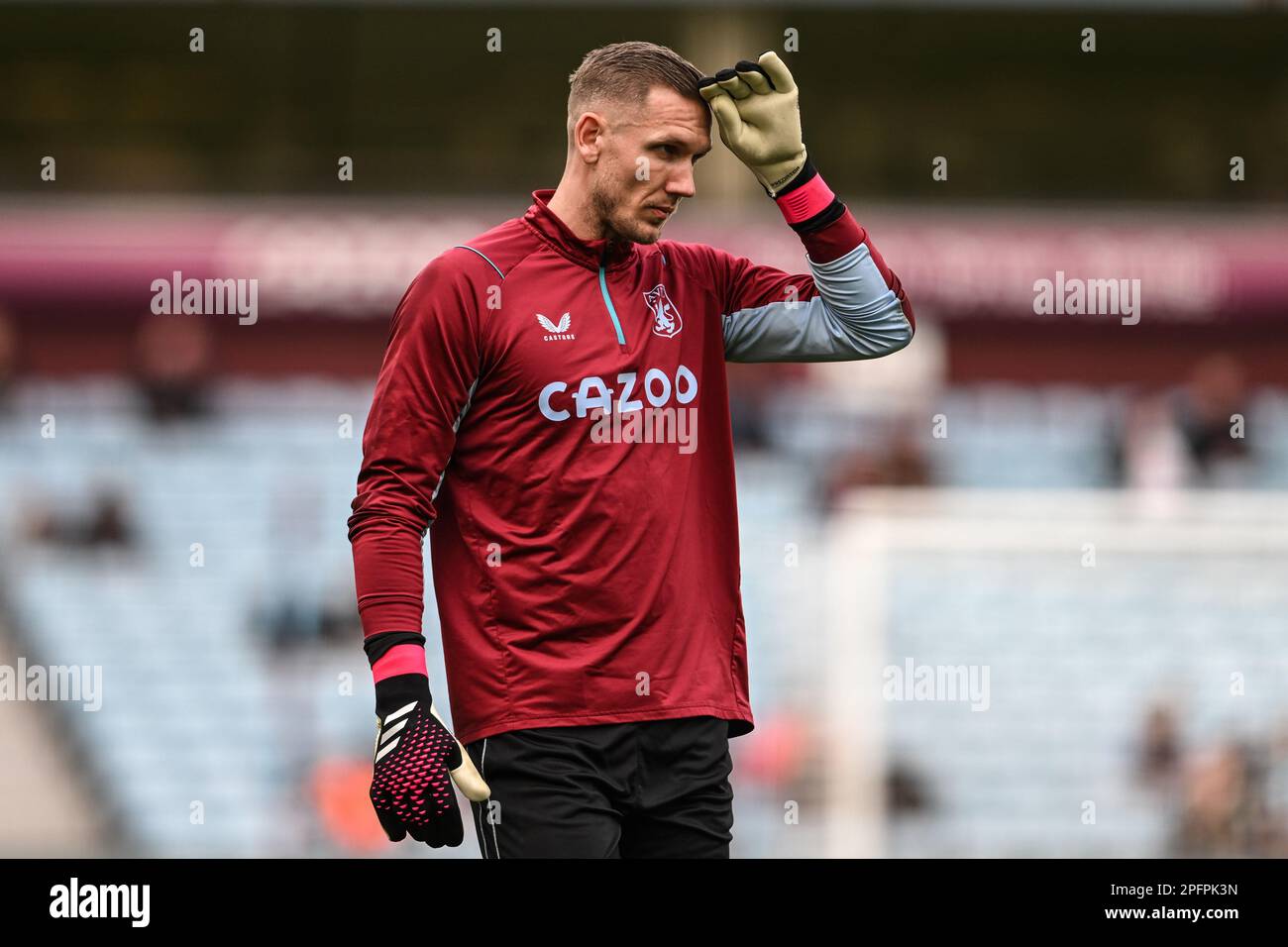 Robin Olsen #25 of Aston Villa warms up before the Premier League match ...