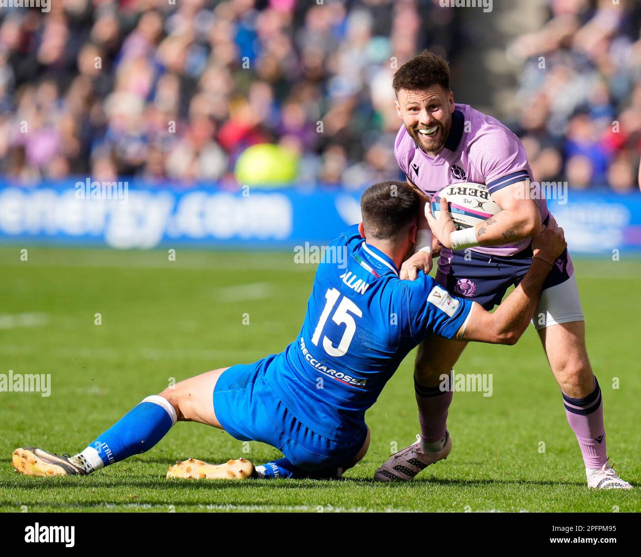 Ali Price #21 of Scotland is tackled by Tommaso Allan #15 of Italy ...