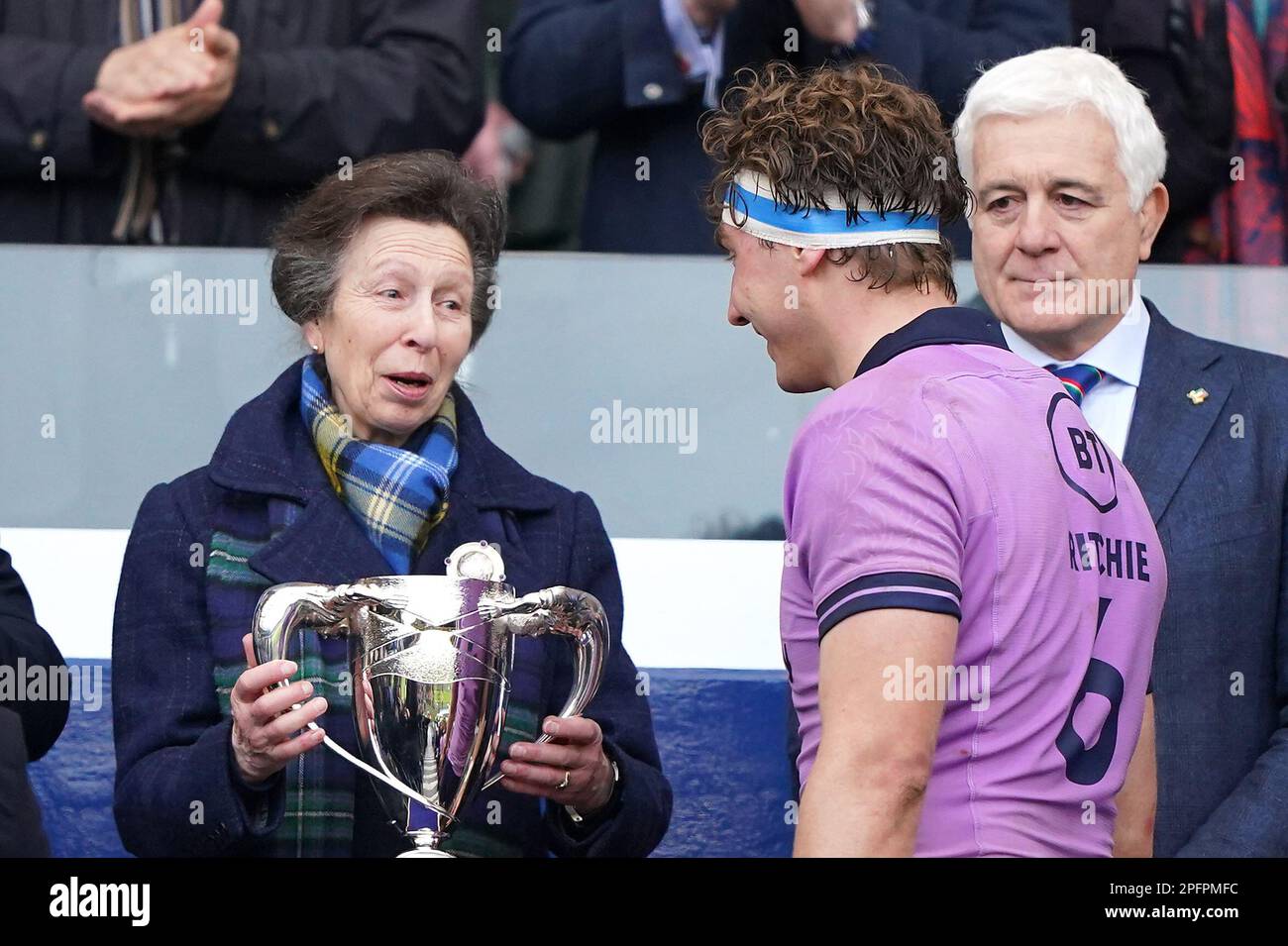 Scotland's Jamie Ritchie is presented with the Cuttitta Cup by the ...