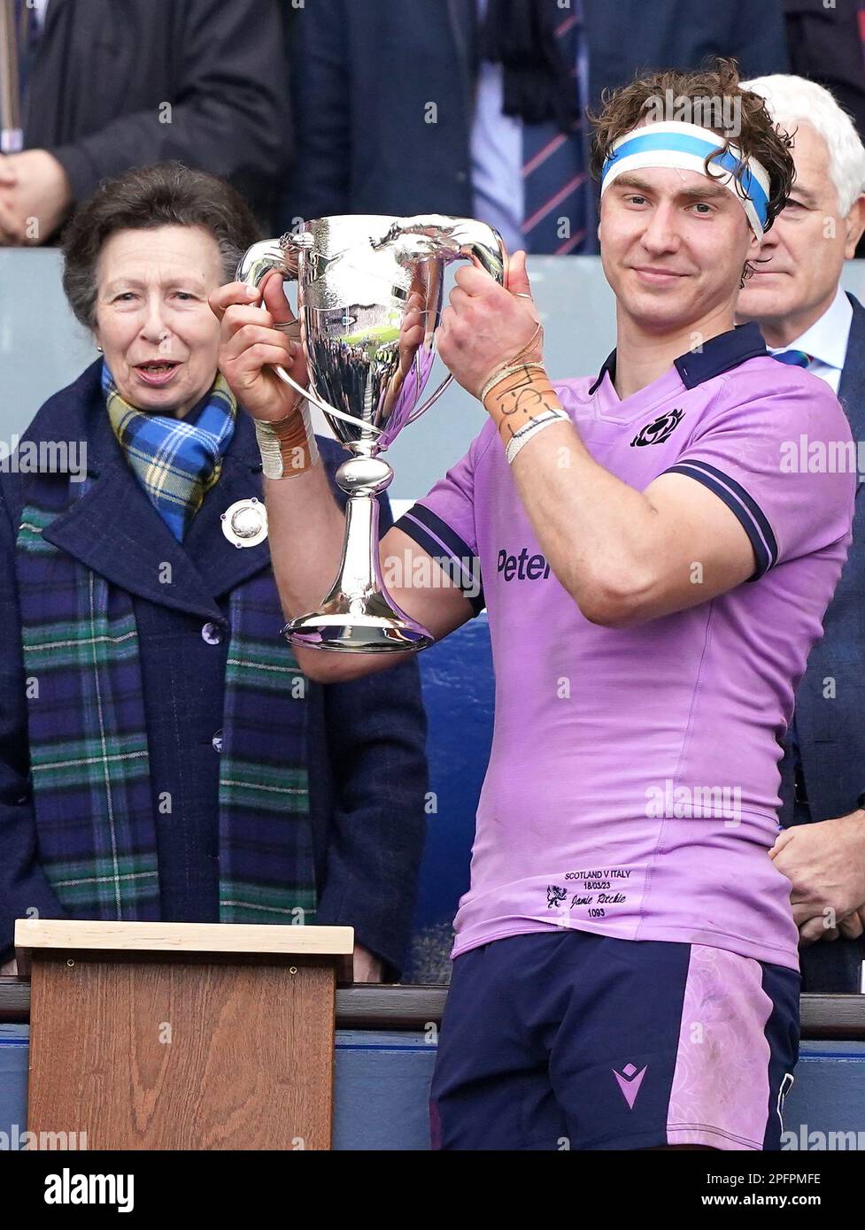 Scotland's Jamie Ritchie is presented with the Cuttitta Cup by the ...