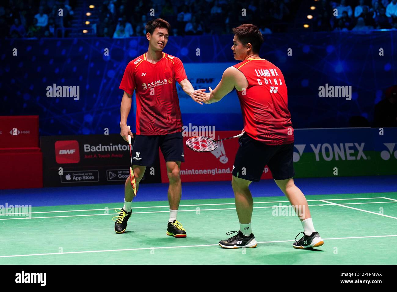 China's Liang Wei Keng (right) and Wang Chang in action against ...