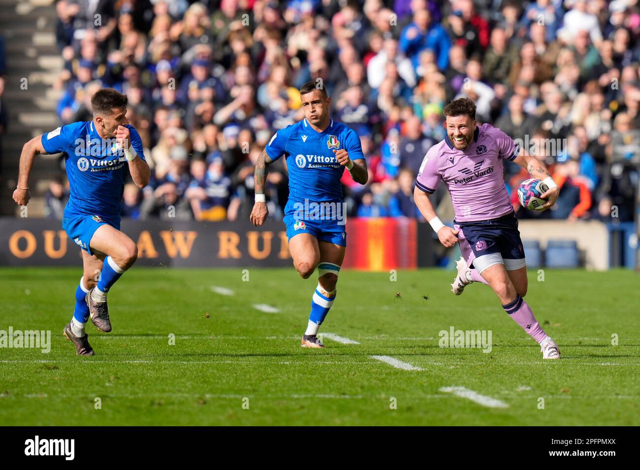 Edinburgh, UK. 18th Mar, 2023. Ali Price #21 of Scotland makes a break ...