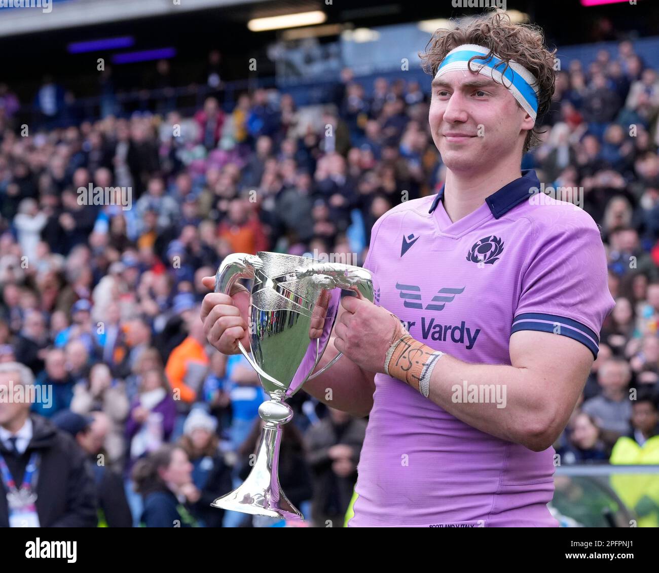 Jamie Ritchie captain of Scotland presents the trophy to the crowd ...