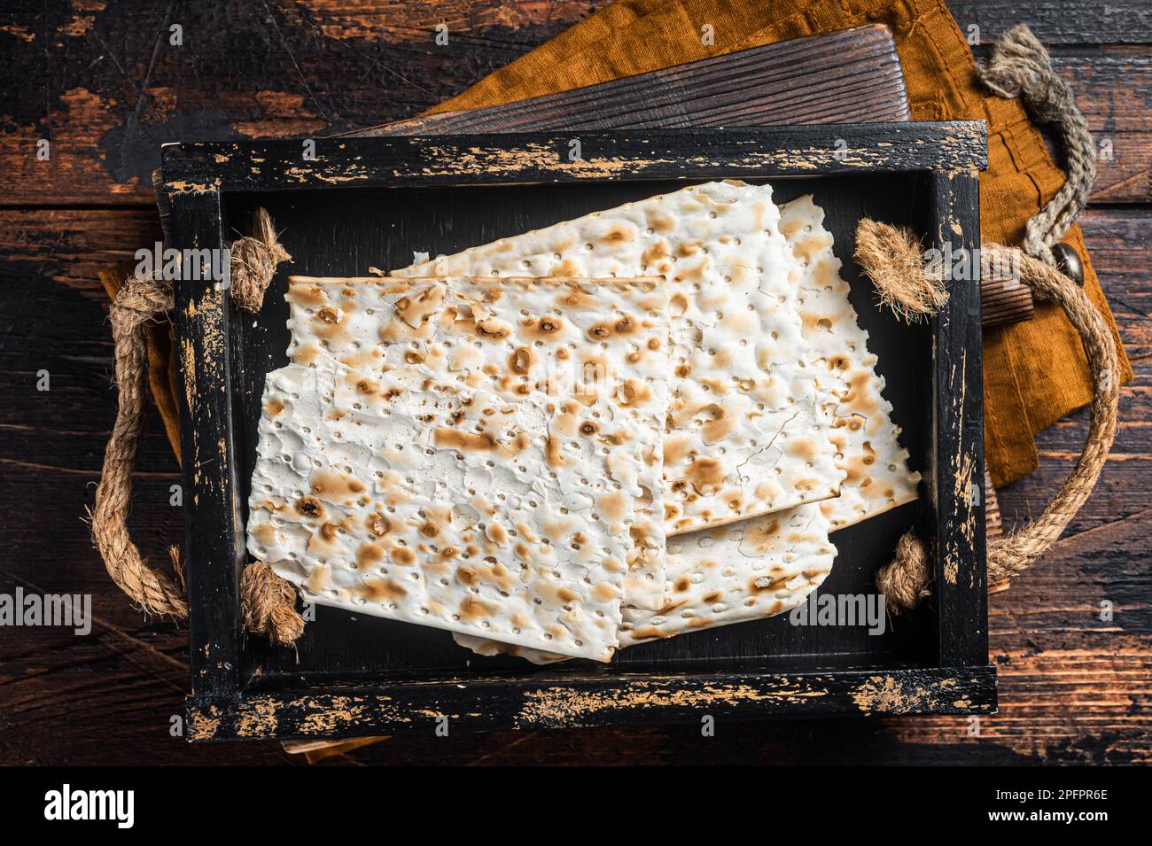Passover matzos of celebration with matzo unleavened bread in a wooden ...