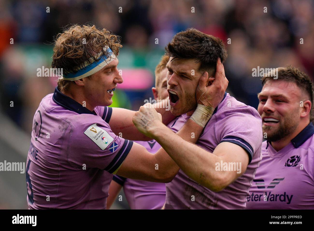Jamie Ritchie #6 of Scotland celebrates with try scorer Blair Kinghorn ...