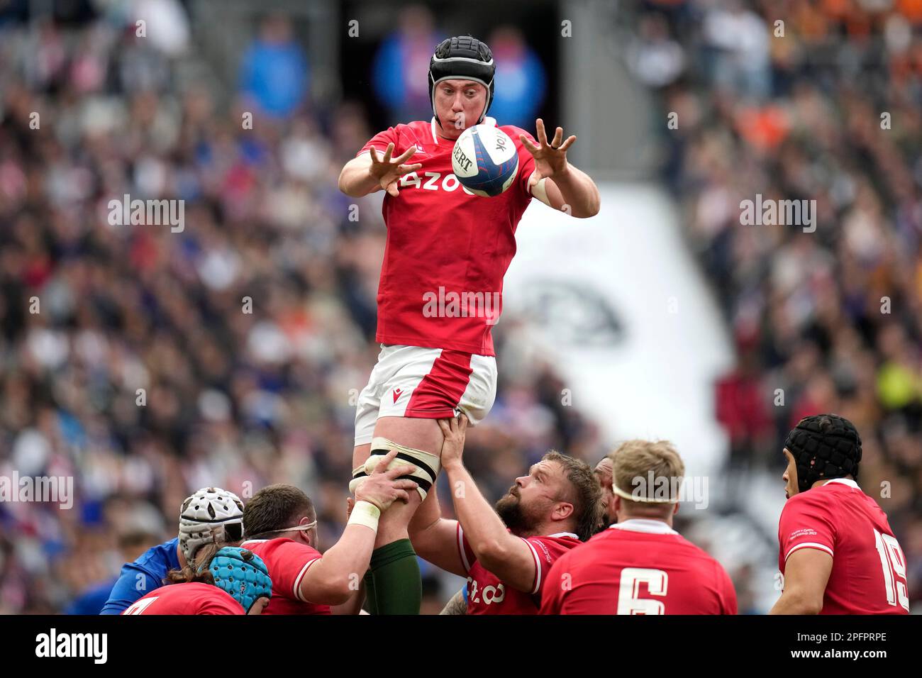 Wales' Adam Beard, top, catches the ball from a line out throw during ...