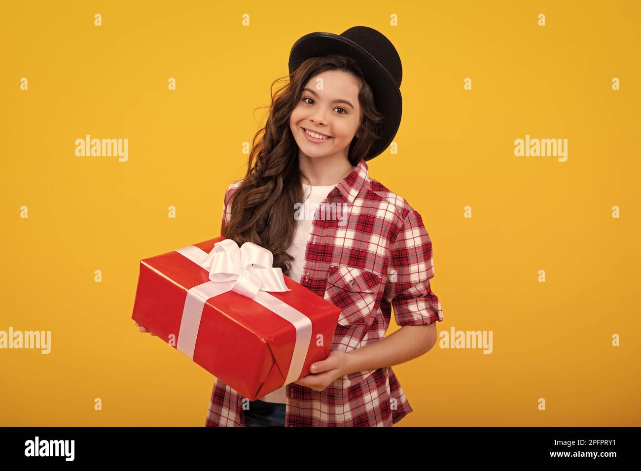 Teenager kid with present box. Teen girl giving birthday gift. Present ...