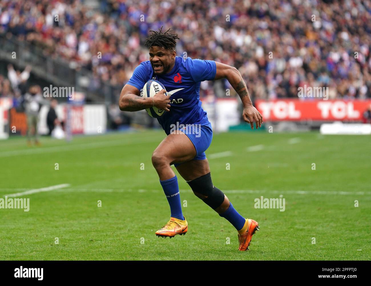 France's Jonathan Danty on the way to score their side's second tryl of ...