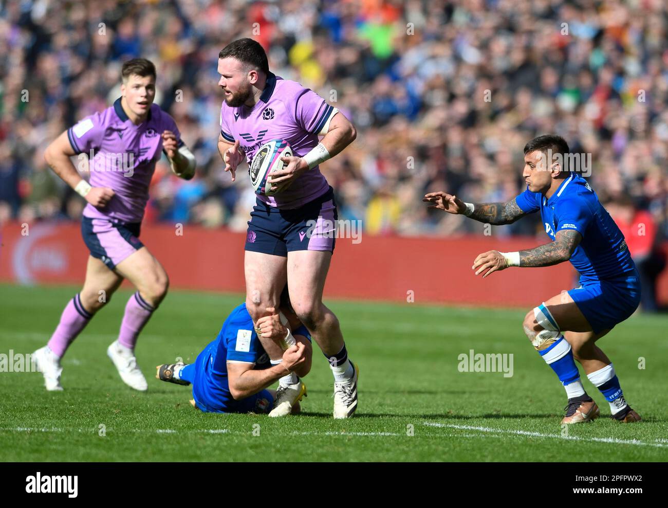 Edinburgh, UK. 18th Mar, 2023. Pierre Bruno of Italy tackles Ewan ...