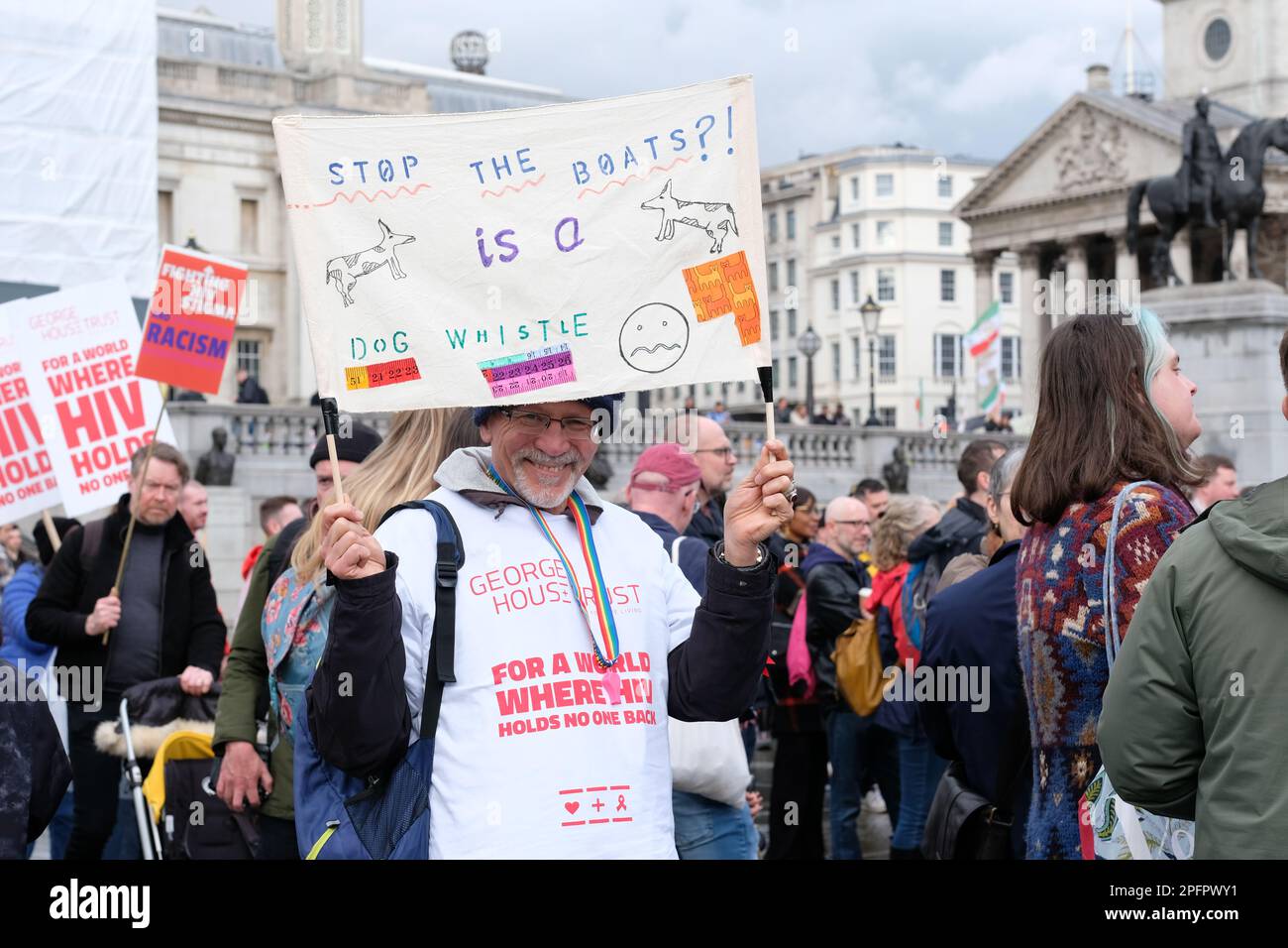 London, UK. 18th Mar, 2023. A person holds a banner during the Fighting ...