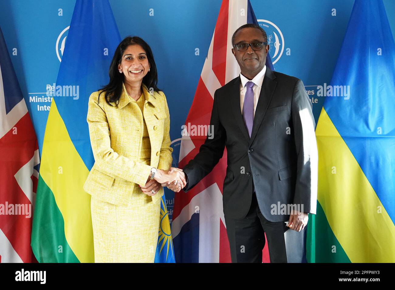 Home Secretary Suella Braverman shakes hands with Rwandan minister for ...