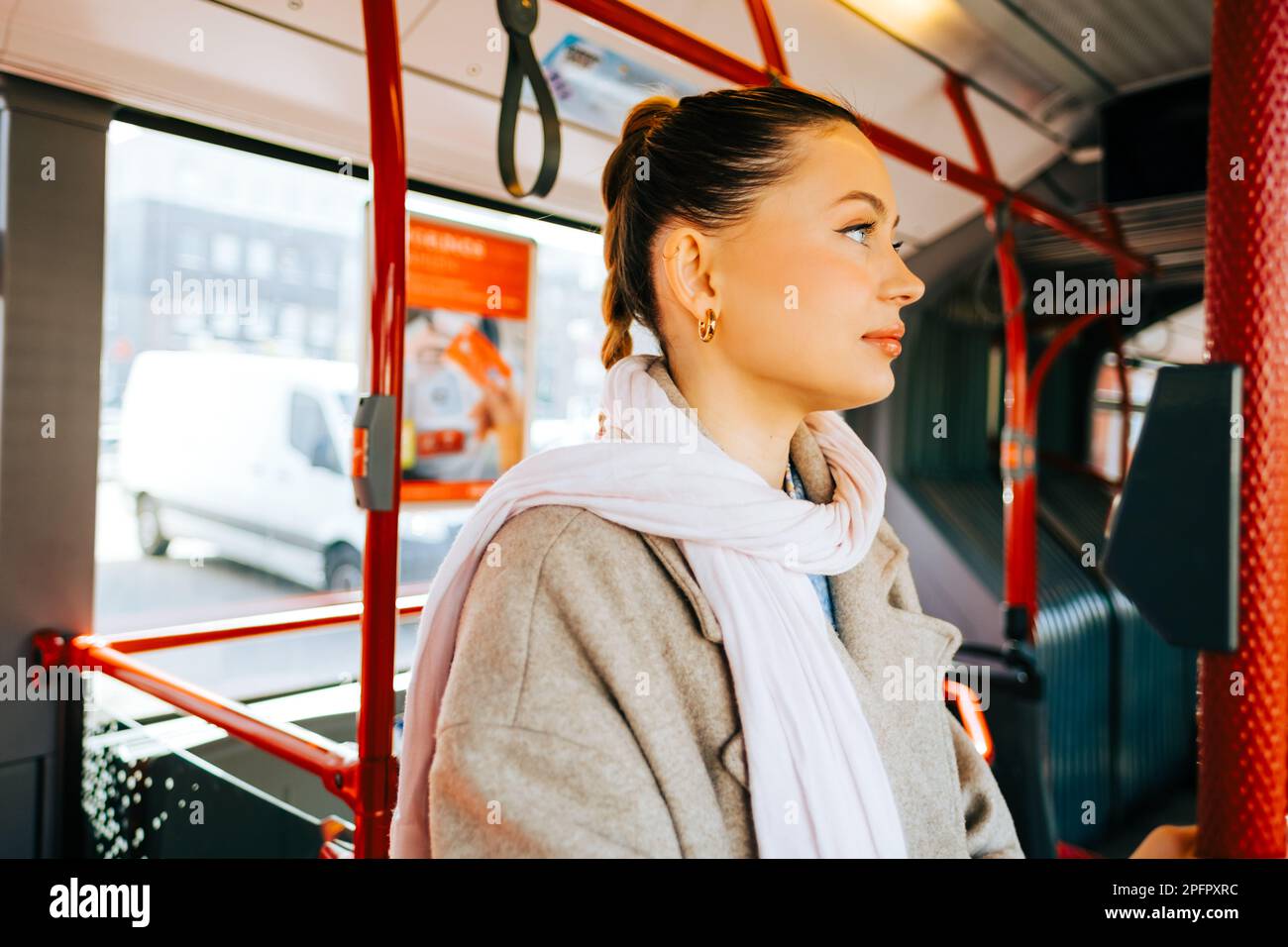 Woman riding bus hi-res stock photography and images - Alamy