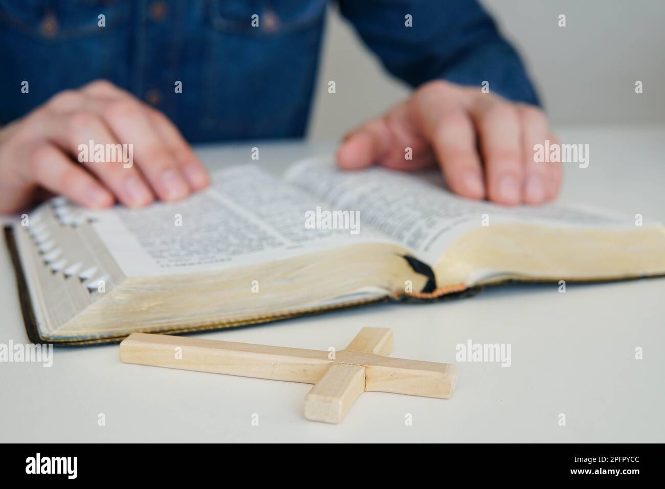 Christian catholic man concentrate on reading Holy Bible at home ...