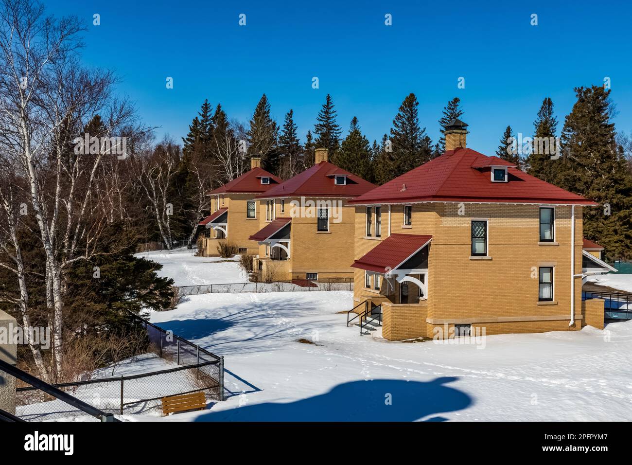 Lighthouse keepers' houses with light tower shadow at Split Rock ...
