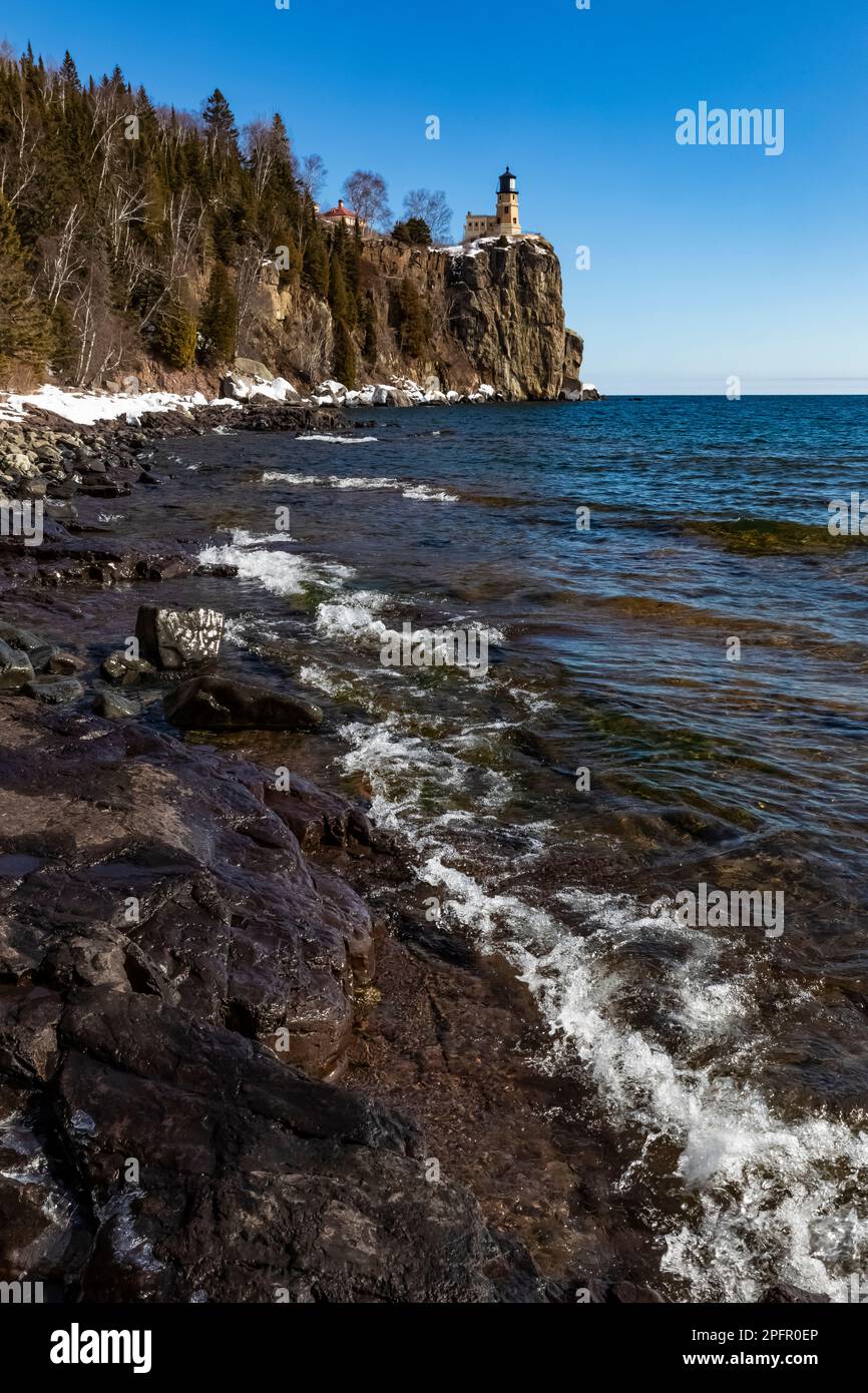 Waves coming ashore on the cobble beach below Split Rock Lighthouse on ...