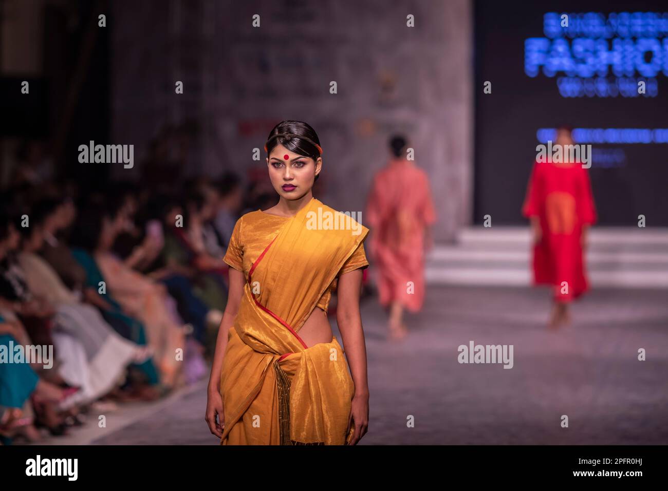 Dhaka, Bangladesh. 17th Mar, 2023. A model walks the runway at the Bangladesh fashion show ...