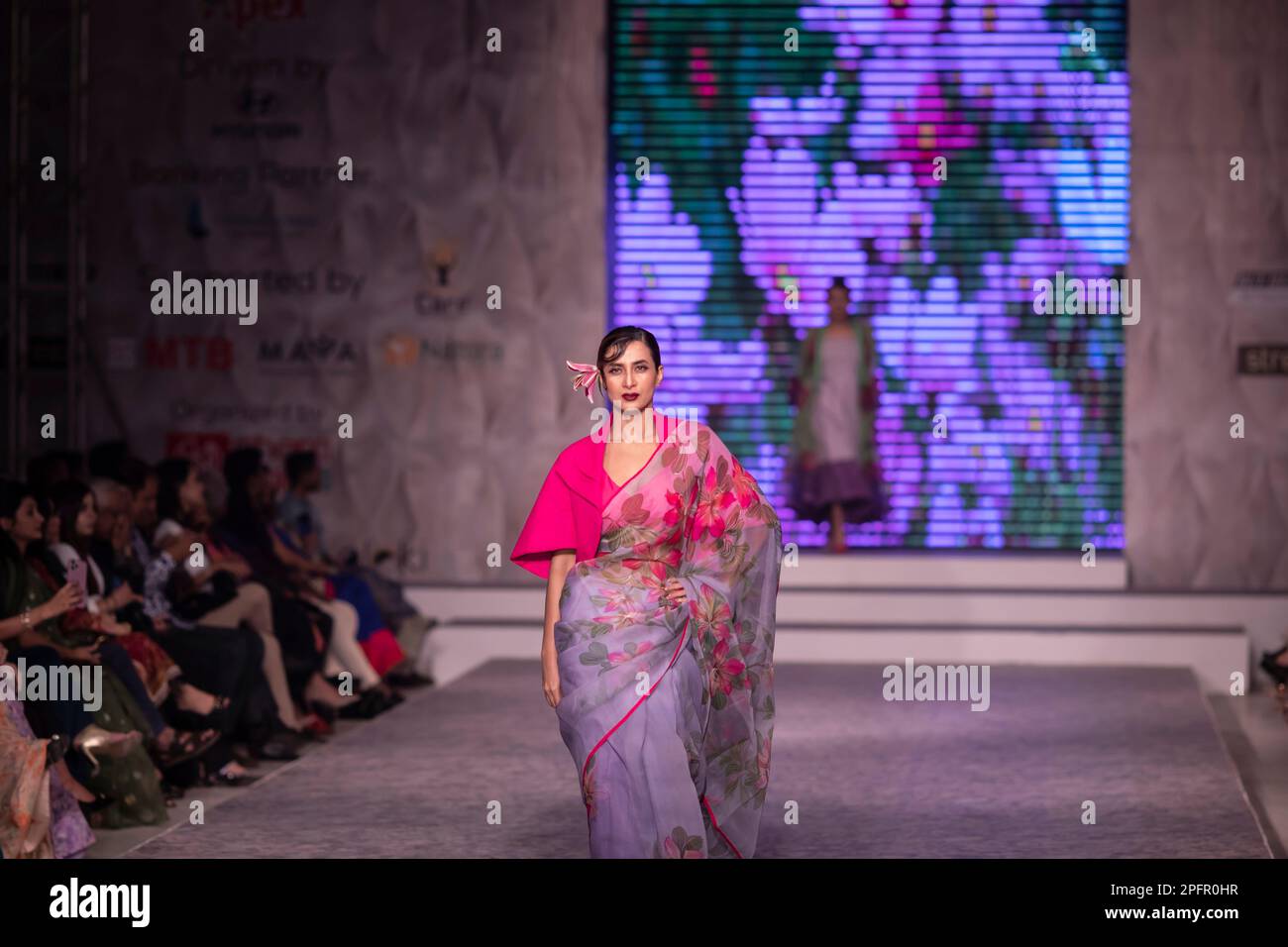 Dhaka, Bangladesh. 17th Mar, 2023. A model walks the runway at the Bangladesh fashion show ...
