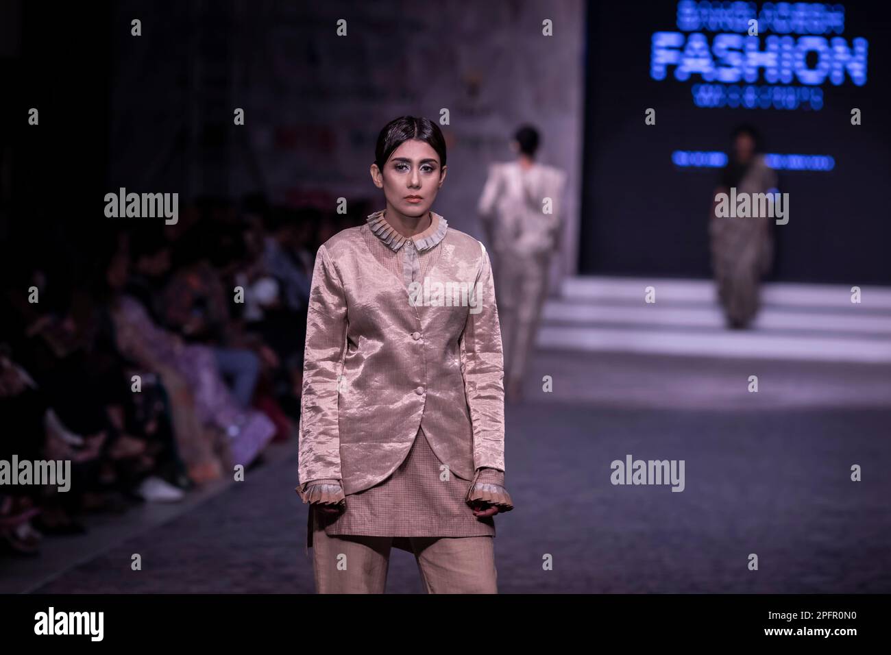 Dhaka, Bangladesh. 17th Mar, 2023. A model walks the runway at the Bangladesh fashion show ...