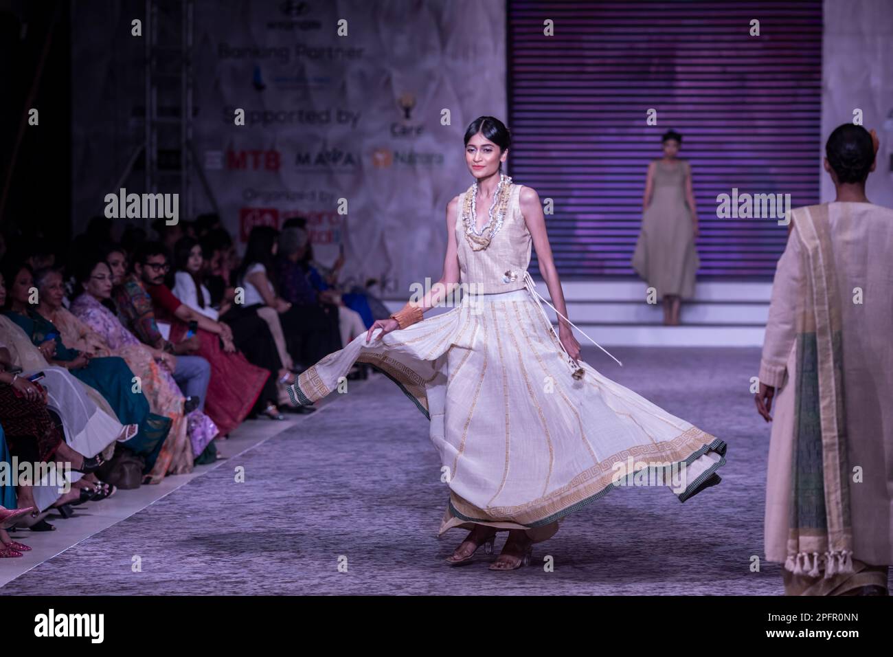 Dhaka, Bangladesh. 17th Mar, 2023. A model walks the runway at the Bangladesh fashion show ...