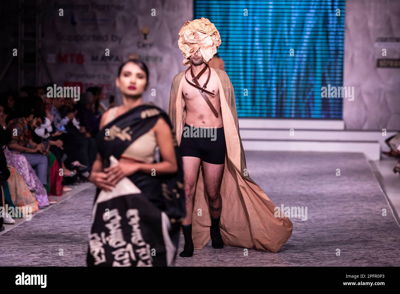 Dhaka, Bangladesh. 17th Mar, 2023. A model walks the runway at the Bangladesh fashion show ...