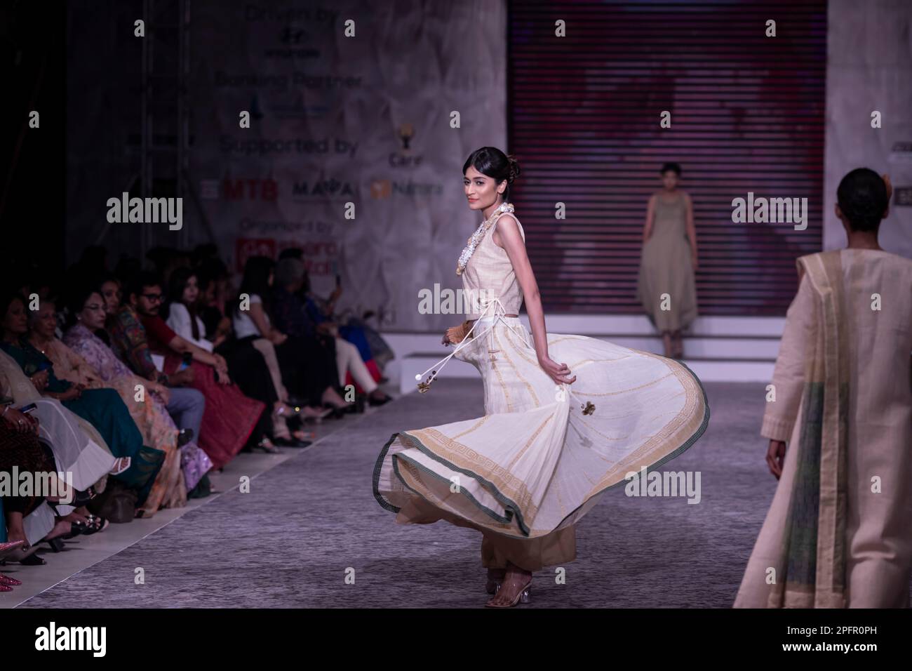 Dhaka, Bangladesh. 17th Mar, 2023. A model walks the runway at the Bangladesh fashion show ...