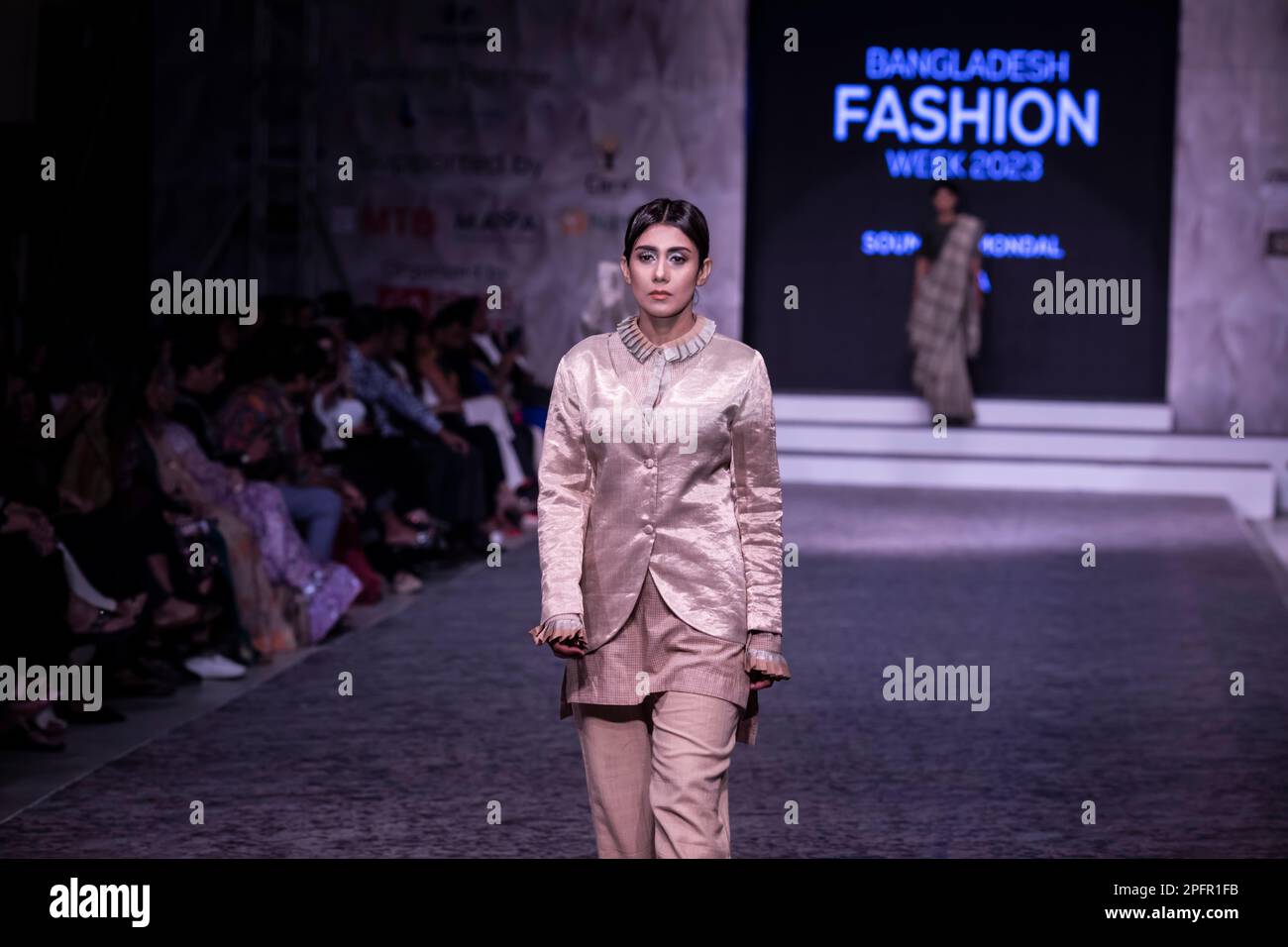Dhaka, Bangladesh. 17th Mar, 2023. A model walks the runway at the Bangladesh fashion show ...
