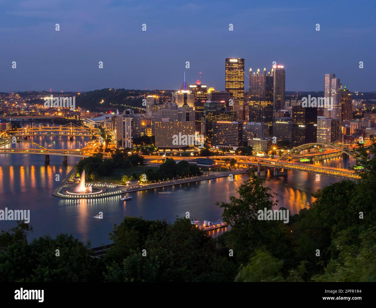 Downtown Pittsburgh skyline at night with rivers, bridges, and the ...